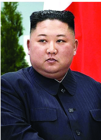 Kim shows off daughter, missiles at NK parade